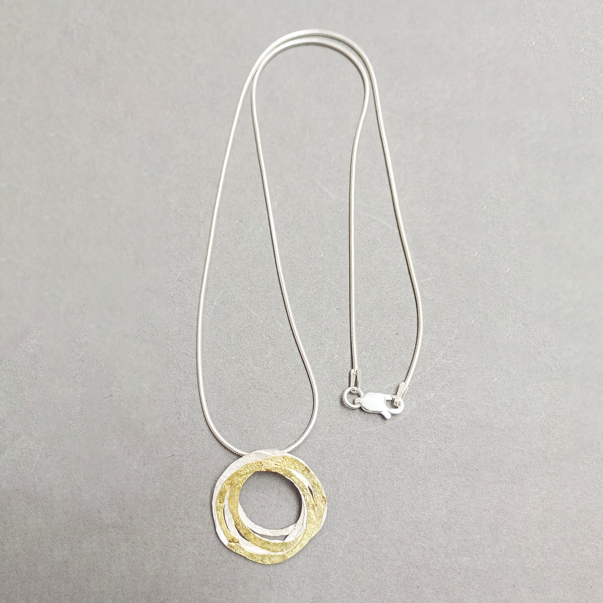 Gold & Silver Wrap Pendant by Shimara Carlow – Bluecoat Display Centre