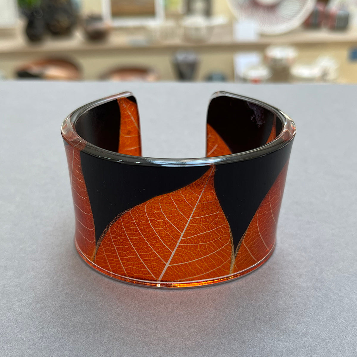 Recycled plastic cuff with skeleton leaf printed design – Bluecoat ...